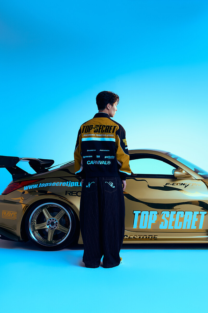 CARNIVAL X TOP SECRET PERFORMANCE JACKET BLACK-GOLD